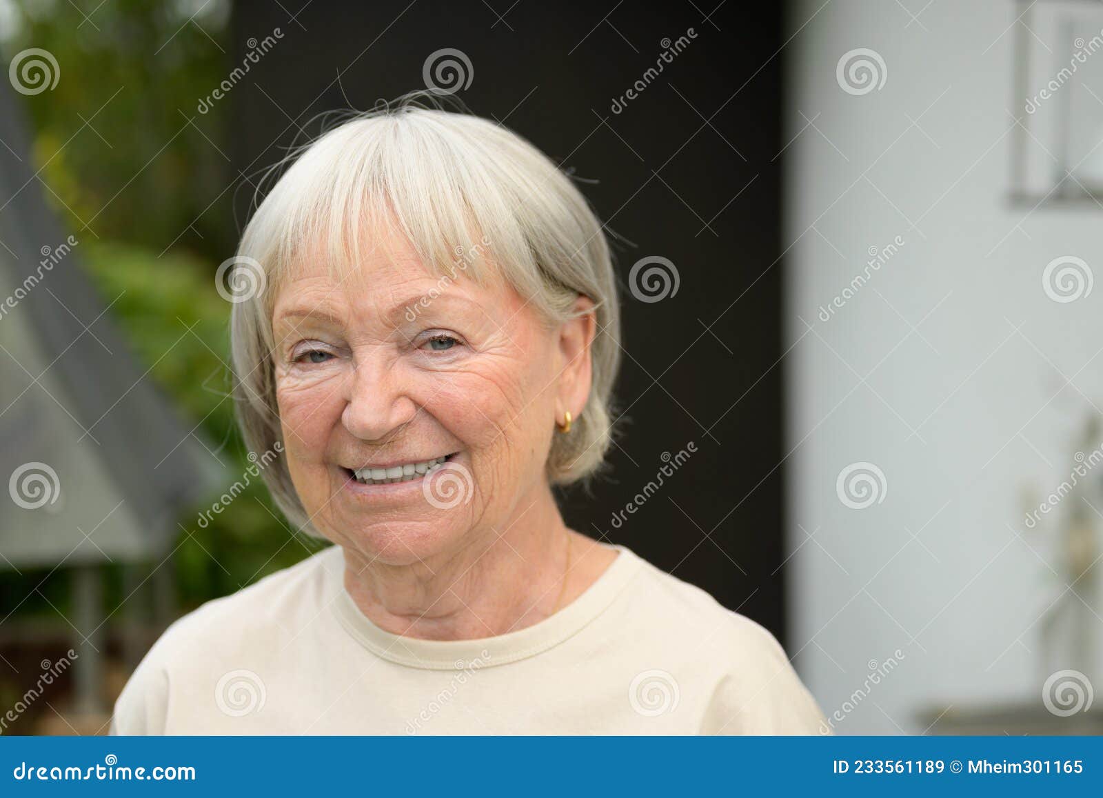 Headshot of a Smiling Friendly Senior Woman Outdoors Stock Image ...