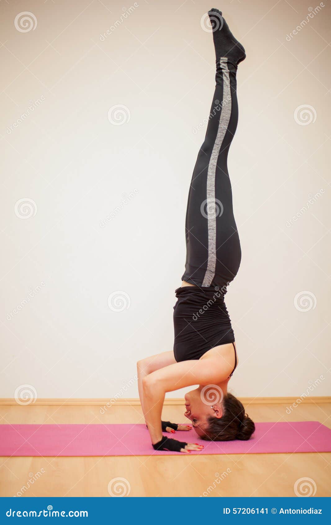 Headstand in a yoga studio stock image. Image of hispanic - 57206141
