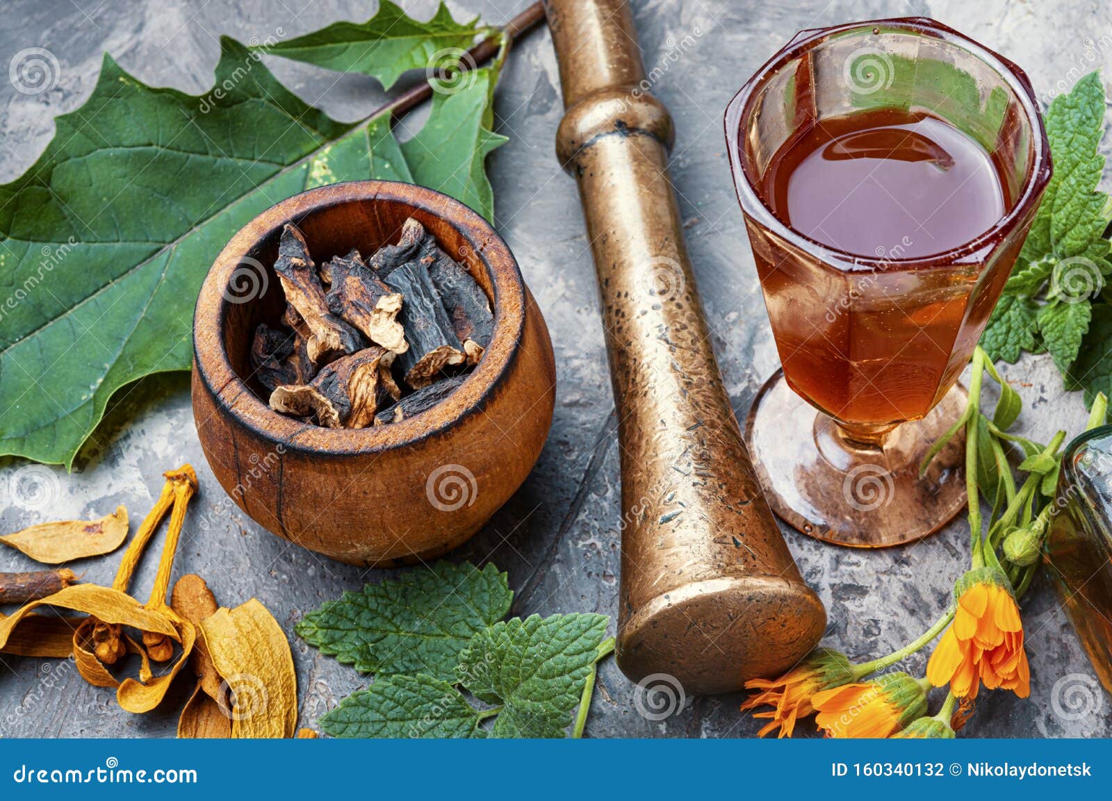 Healing Herbs and Bottle of Elixir Stock Photo - Image of flower, herb ...