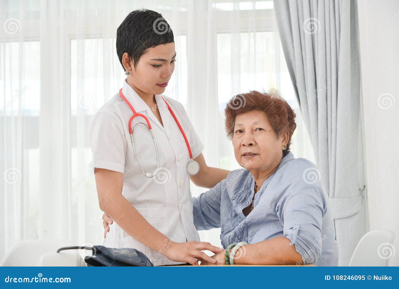 Health Care Worker Helping an Elderly Patient. Stock Image - Image of ...