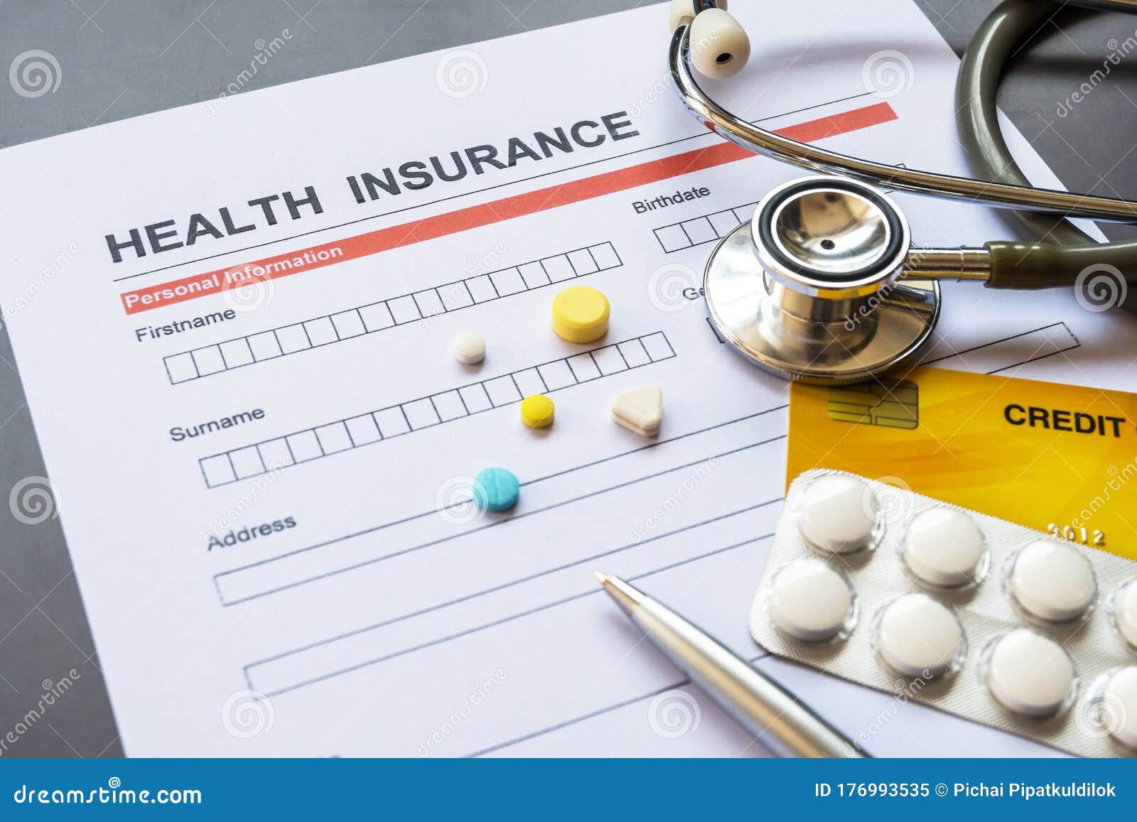 Health Insurance Form with Model and Policy Document Stock Image ...