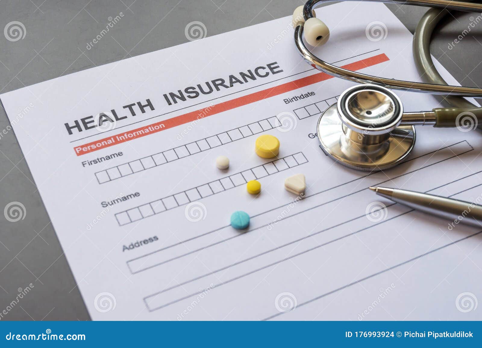 Health Insurance Form with Model and Policy Document Stock Photo ...