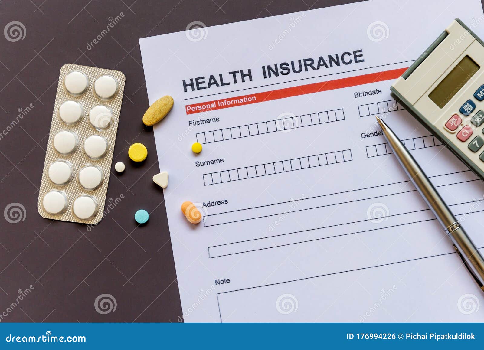 Health Insurance Form with Model and Policy Document Stock Photo ...