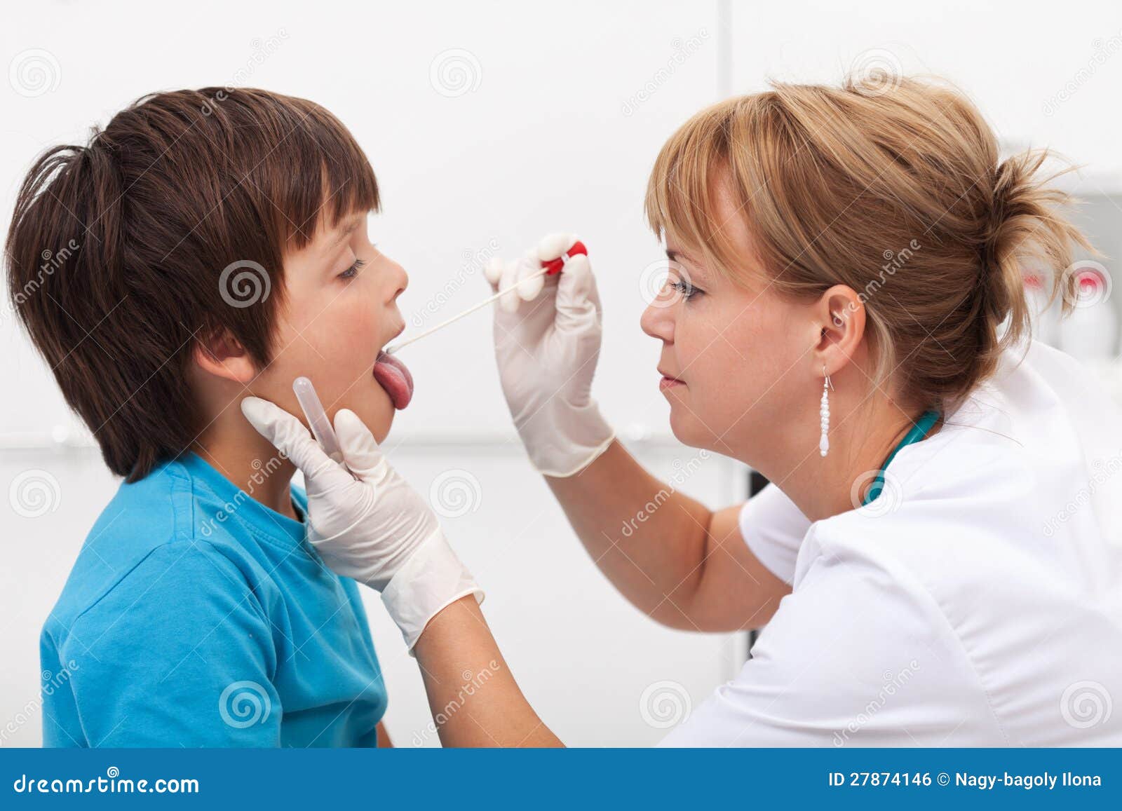 Health Professional Taking Saliva Sample from Boy Stock Photo - Image ...