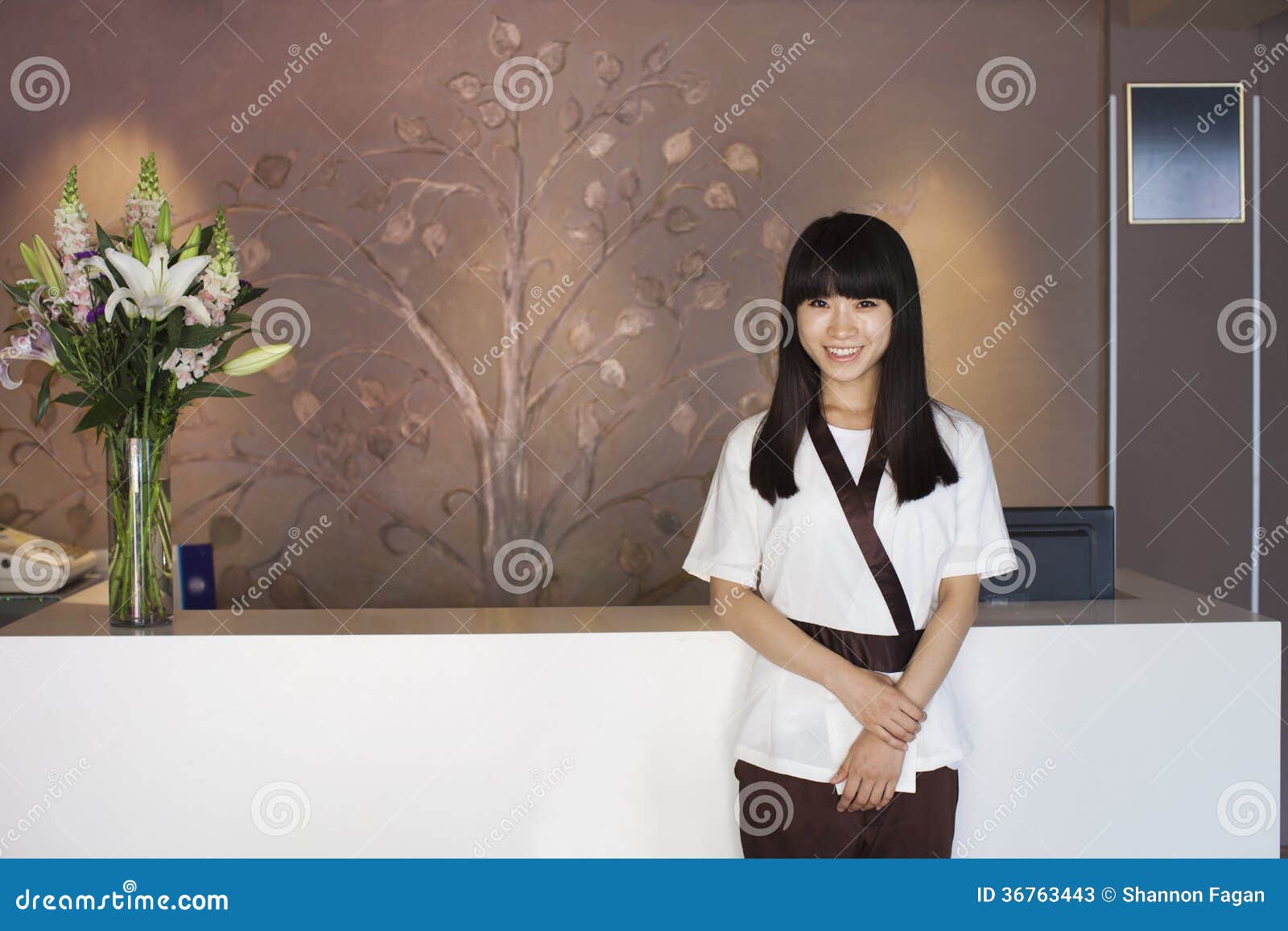 Health Spa Receptionist stock image. Image of arms, horizontal - 36763443