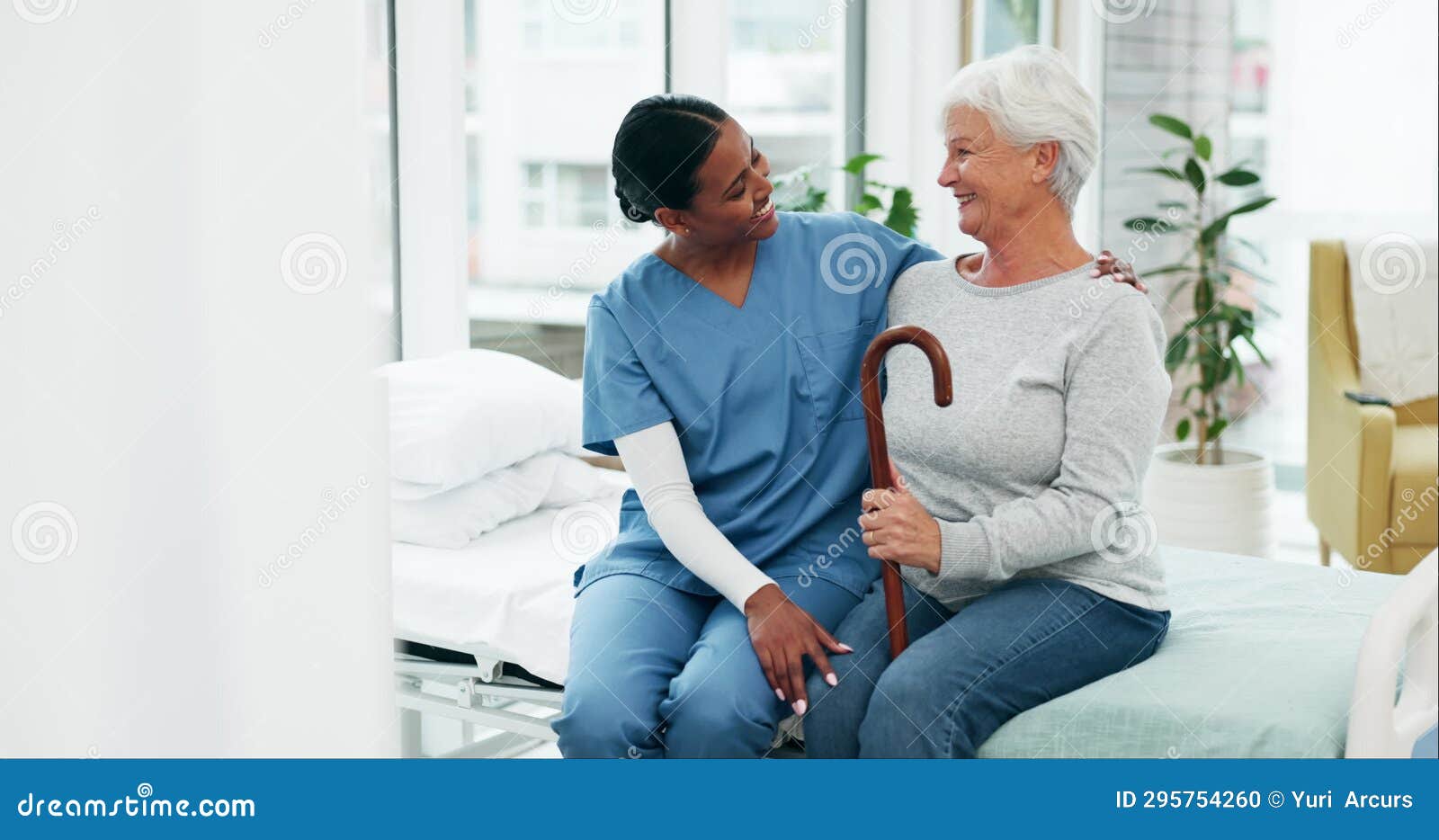 Healthcare Black Woman Nurse Hugging A Senior Patient With A