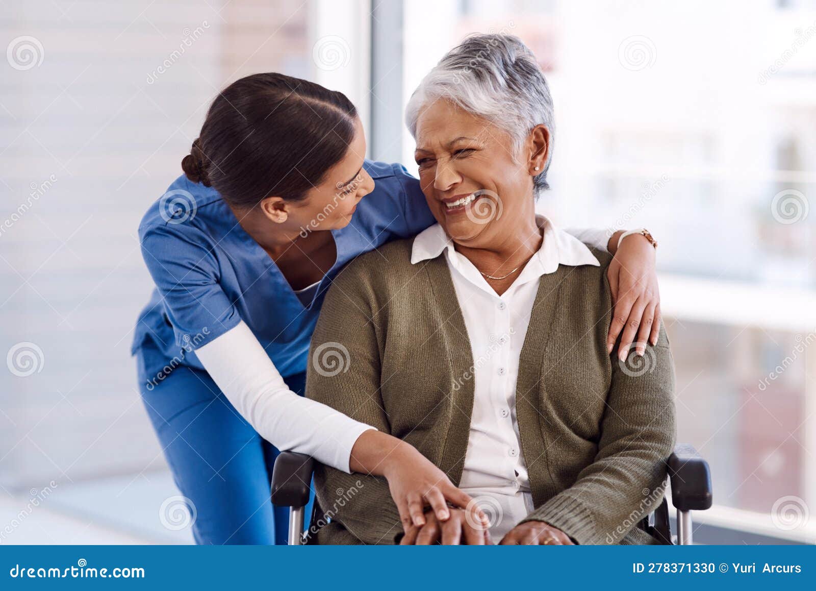 Healthcare Disability And A Nurse Hugging An Old Woman In A Wheelchair