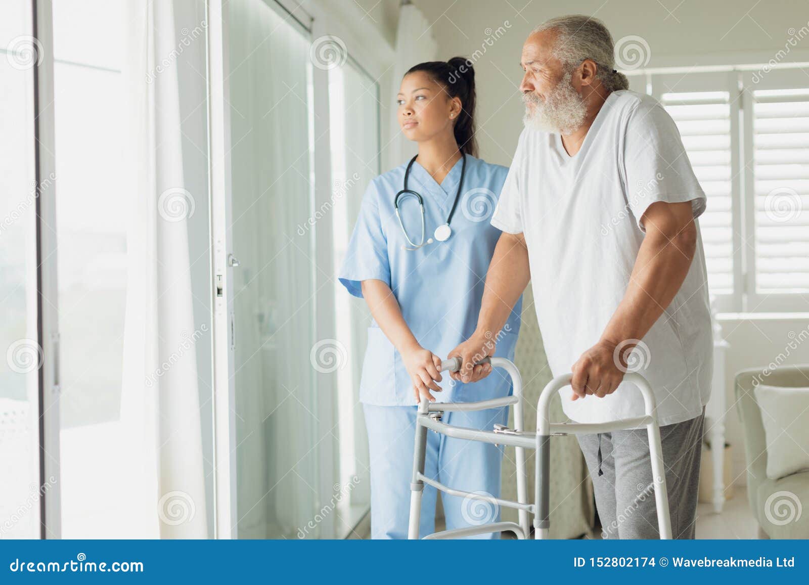 Healthcare Worker with Man Using Walking Support Stock Photo - Image of ...