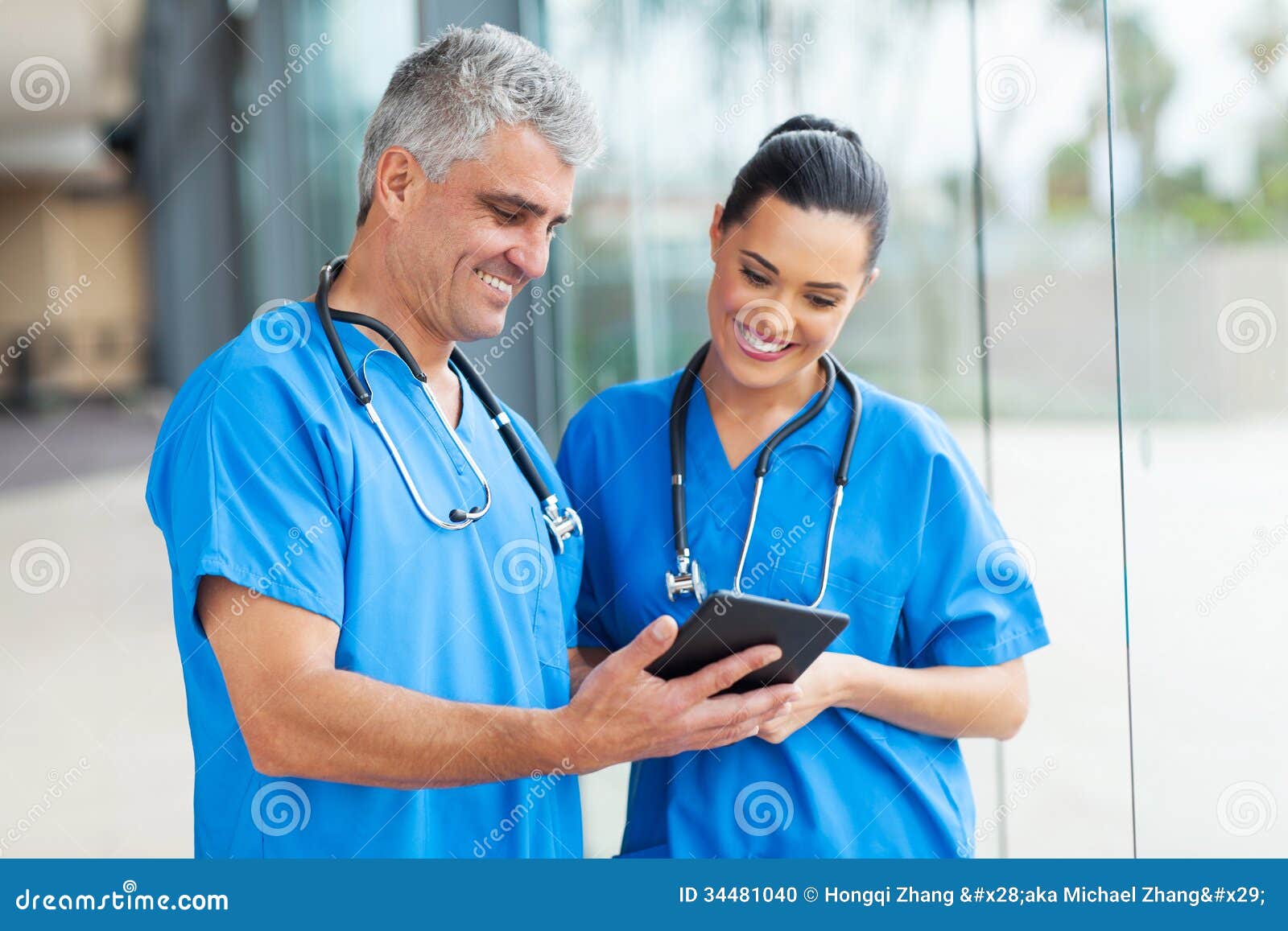 Healthcare Workers Tablet Computer Stock Photo - Image of mature ...