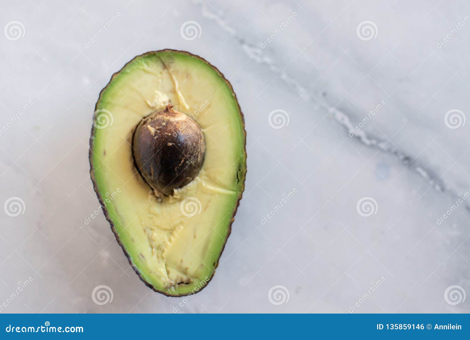 Avocado and Avocado Pieces on a Table Stock Photo - Image of gourmet ...