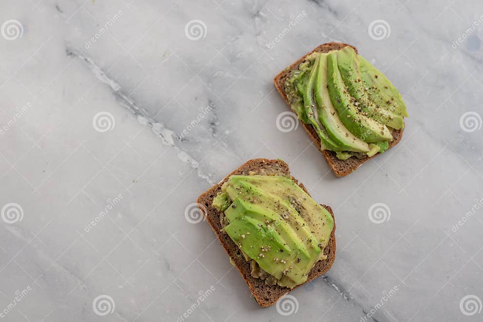 Healthy Avocado Toast. Mashed Avocado on Whole Grain Rye Bread Stock ...