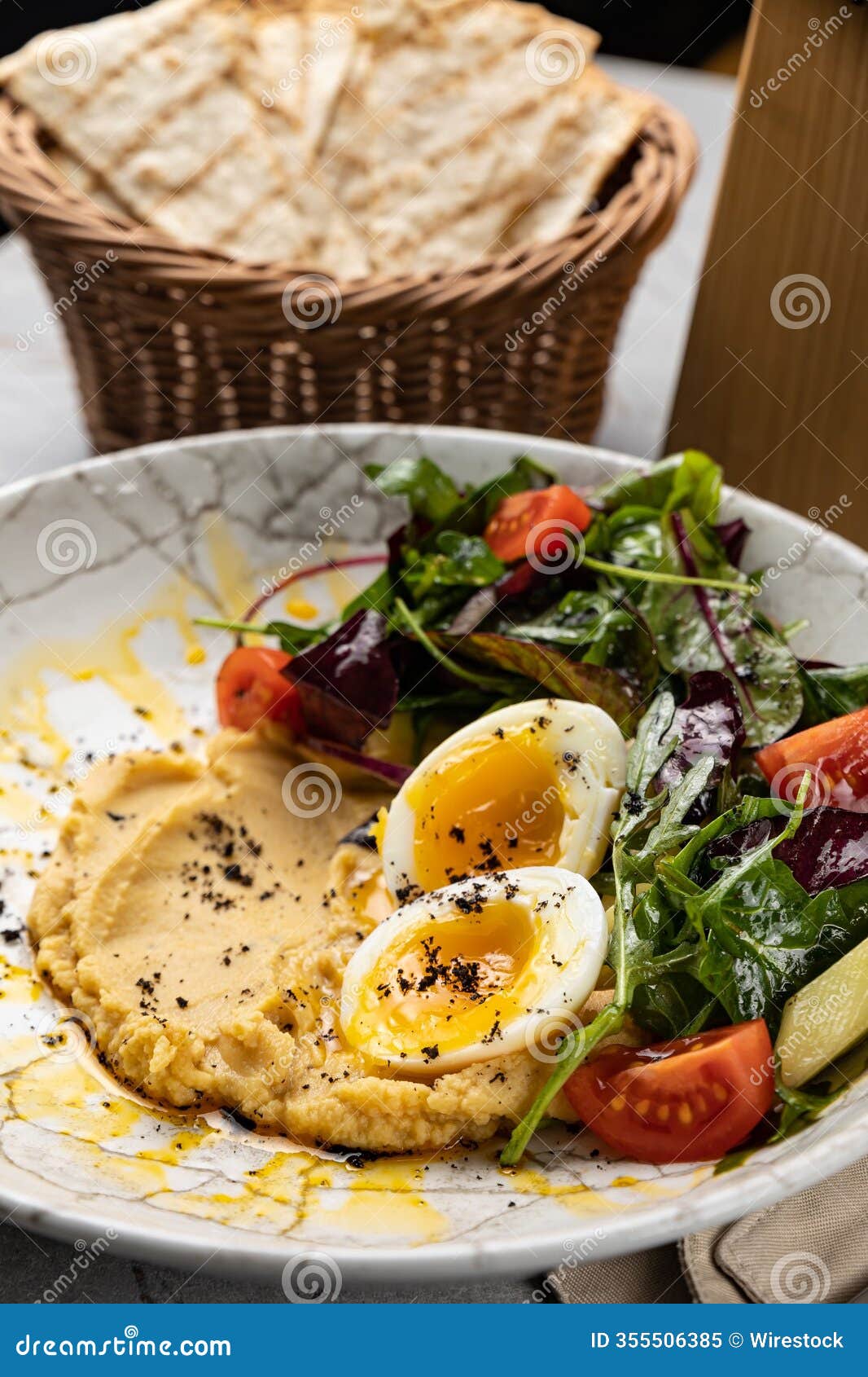 Healthy Bowl of a Fresh Breakfast Made with Hummus, Boiled Eggs and ...