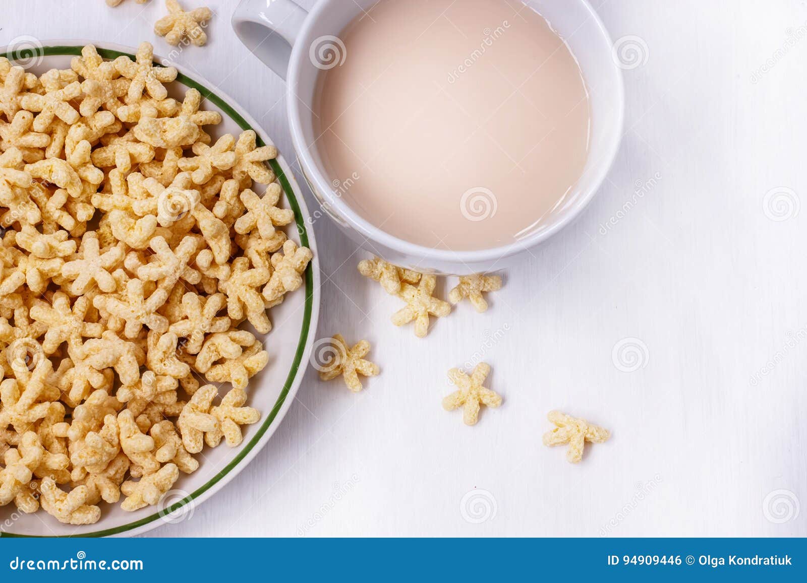 A Healthy Breakfast of Corn Flakes, Milk and Tea on a White Table Stock ...