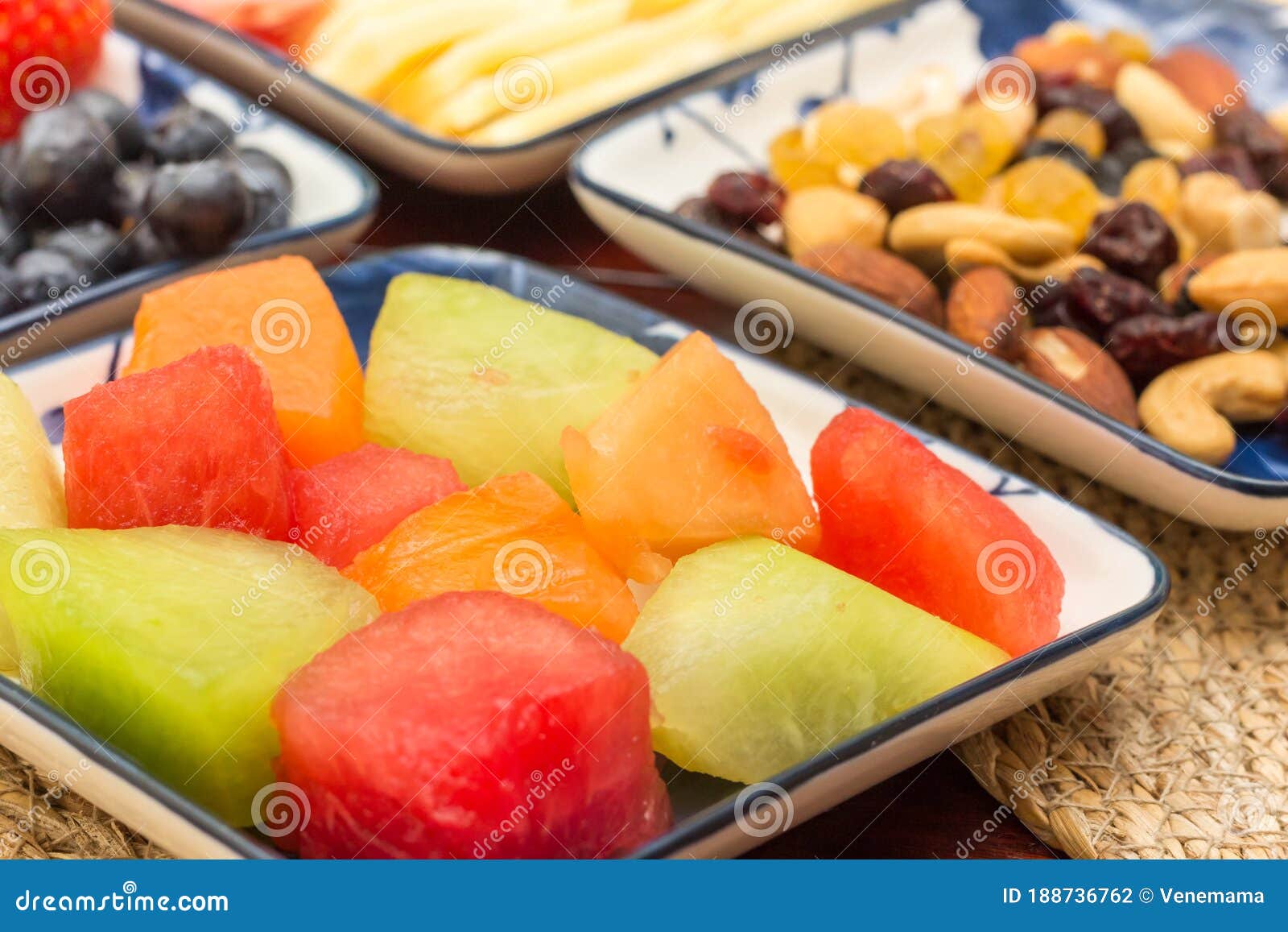 Healthy Breakfast with Fresh Melon and Nuts Stock Photo - Image of ...