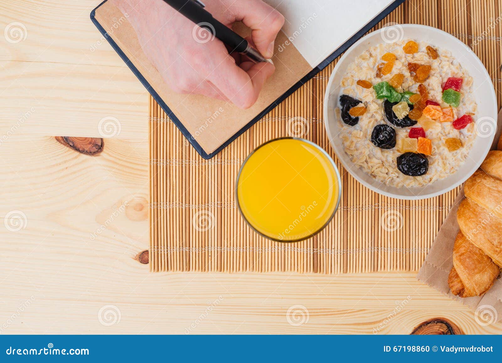 Healthy Breakfast and Hand Writing in Notebook on the Table Stock Photo ...