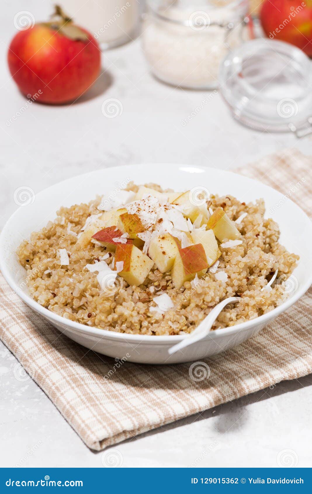 Healthy Breakfast Quinoa with Apple and Coconut, Vertical Stock Photo ...