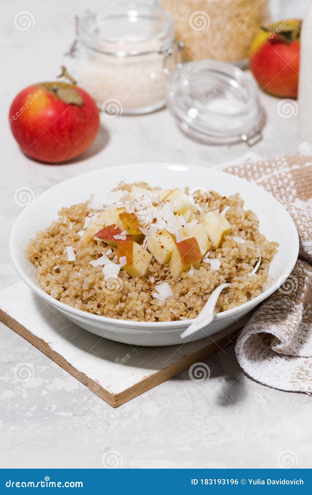 Healthy Breakfast Quinoa with Apple and Coconut on White Table ...