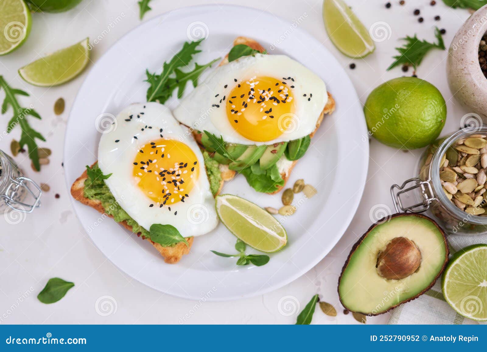Healthy Breakfast Or Snack Sliced Avocado And Fried Egg On Toasted