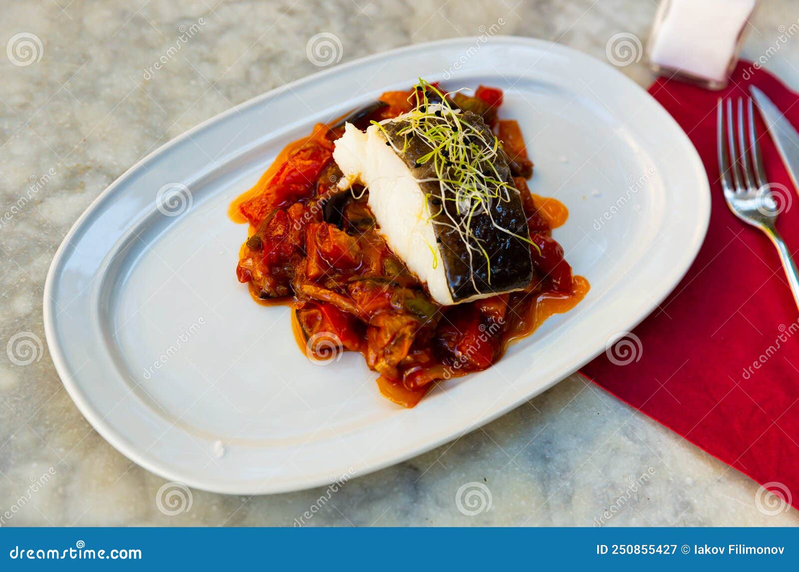 Cod Confit with Vegetable Ratatouille on Plate Stock Image - Image of ...