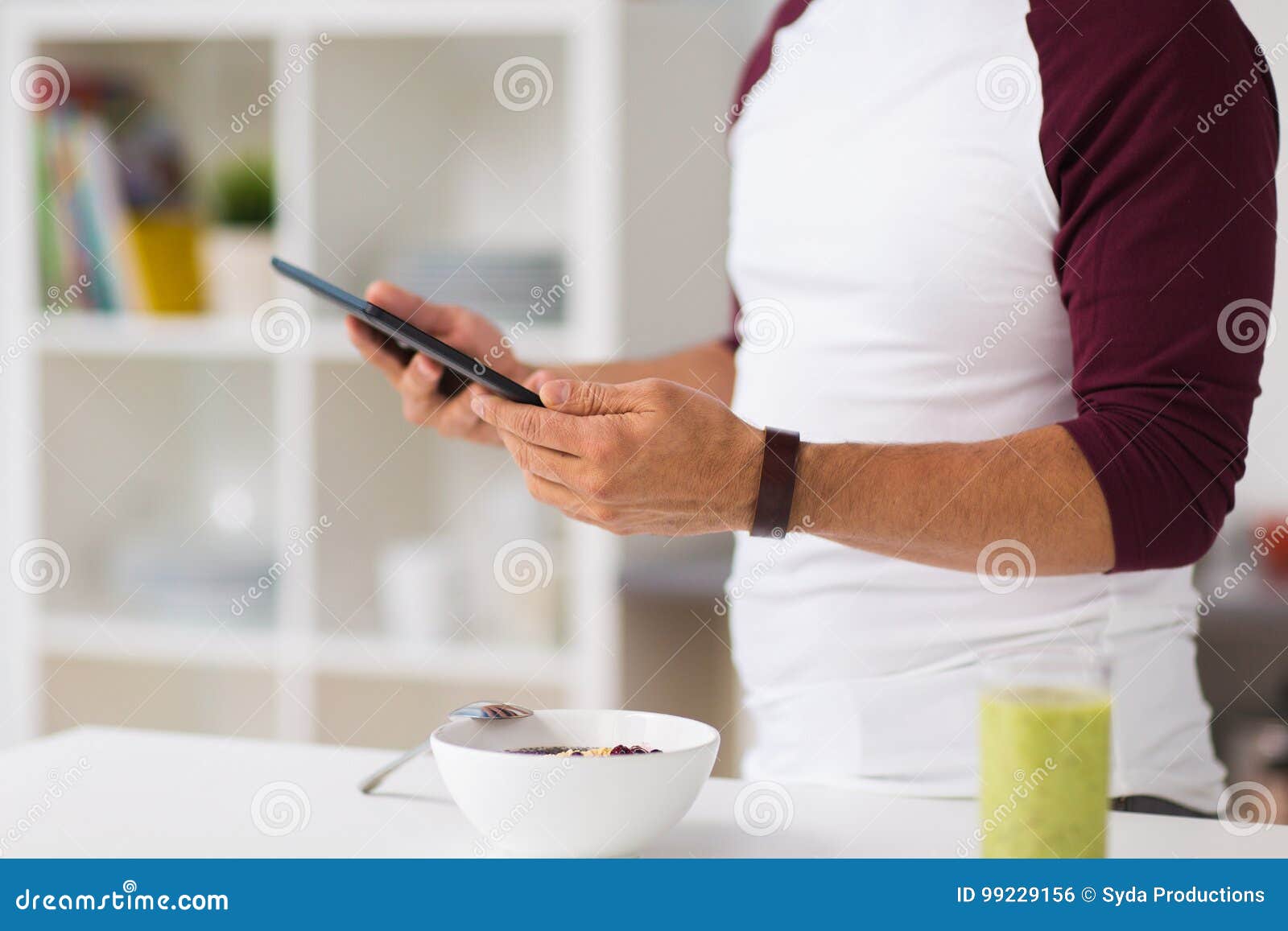 Man with Tablet Pc Having Breakfast at Home Stock Photo - Image of home ...