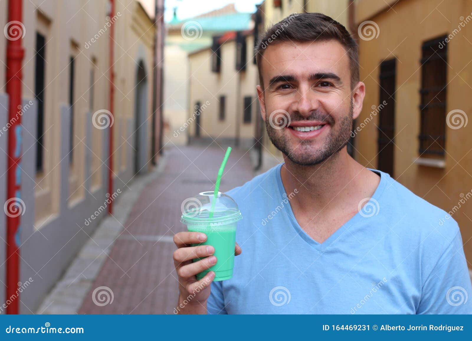 Healthy Guy Drinking a Smoothie on the Go Stock Image - Image of ...