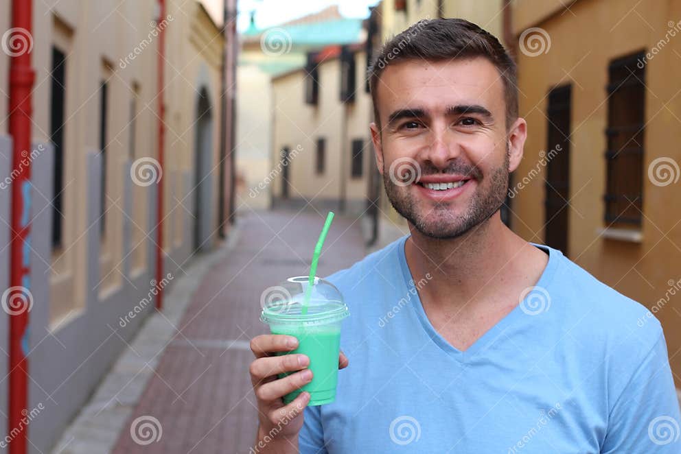 Healthy Guy Drinking a Smoothie on the Go Stock Image - Image of ...