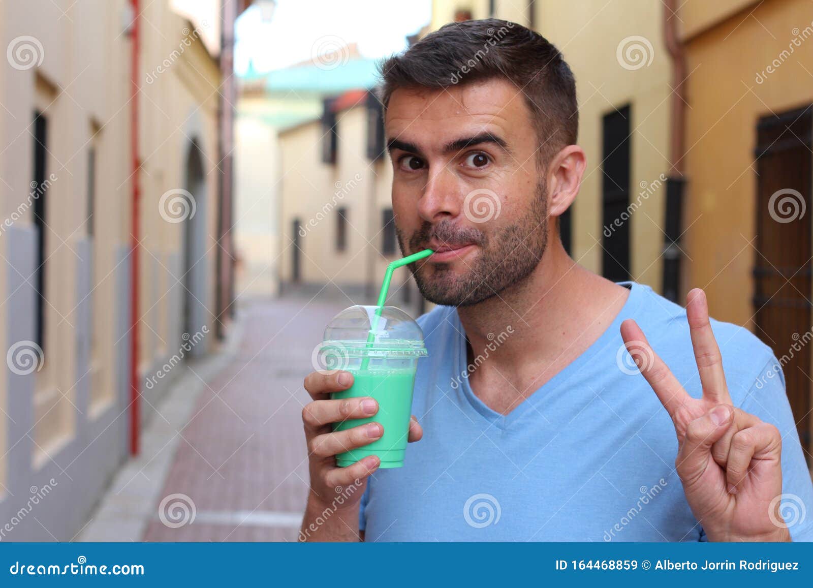Healthy Guy Drinking a Smoothie on the Go Stock Image - Image of ...