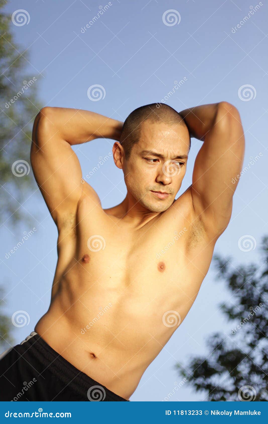 Lean Athletic Shirtless Young Man Standing On Dark Background Royalty ...