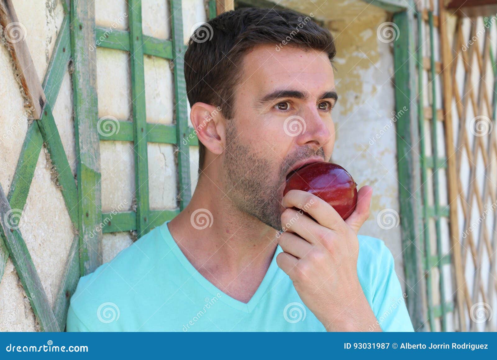 Healthy Man Joyfully Biting an Apple Stock Image - Image of cheerful ...
