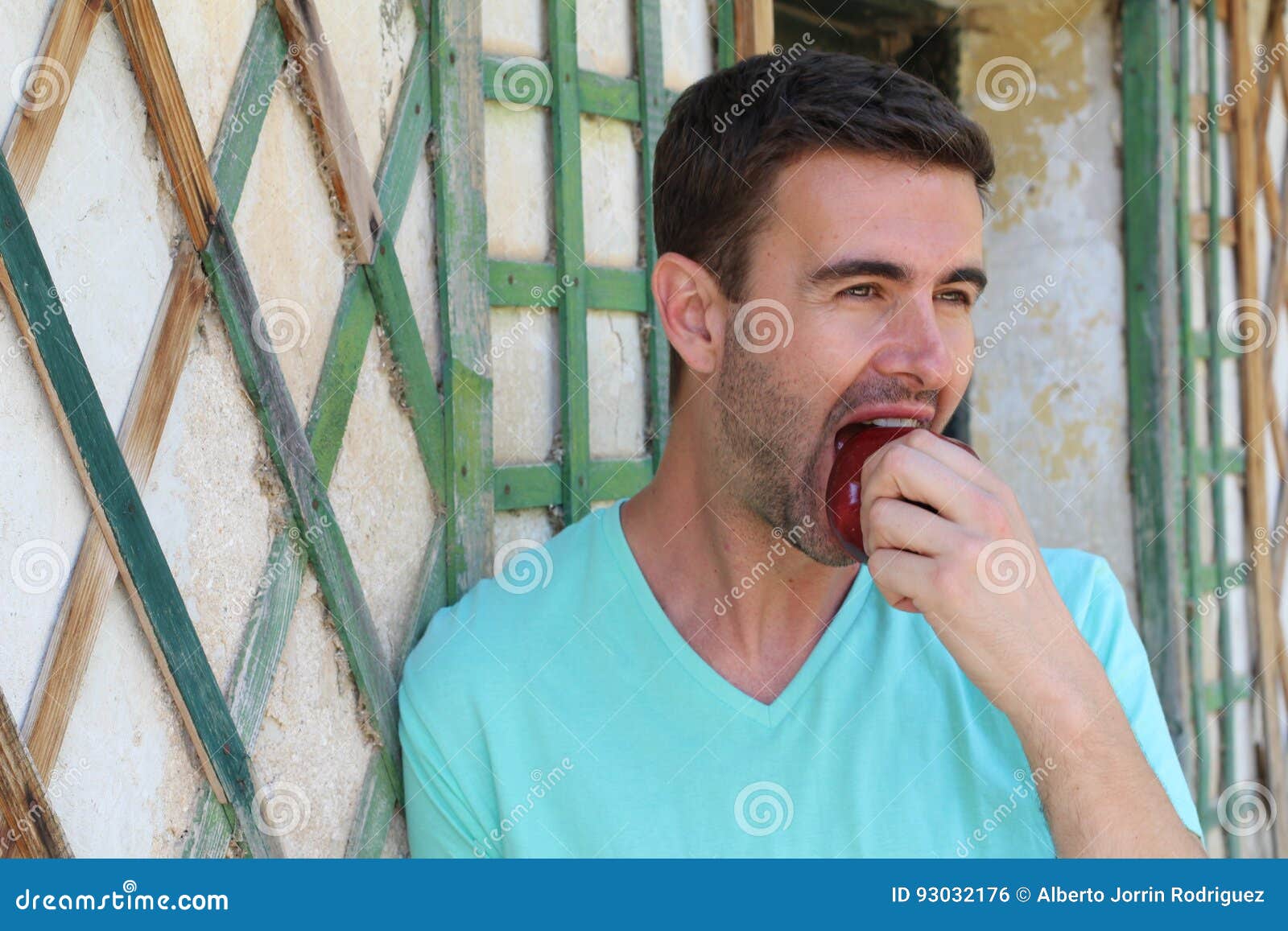 Healthy Man Joyfully Biting an Apple Stock Photo - Image of happy ...