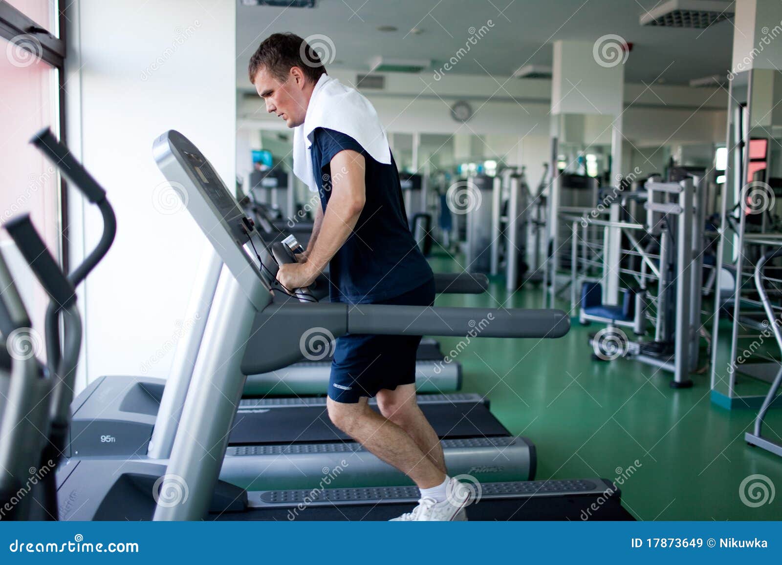Healthy man a treadmill stock image. Image of active - 17873649