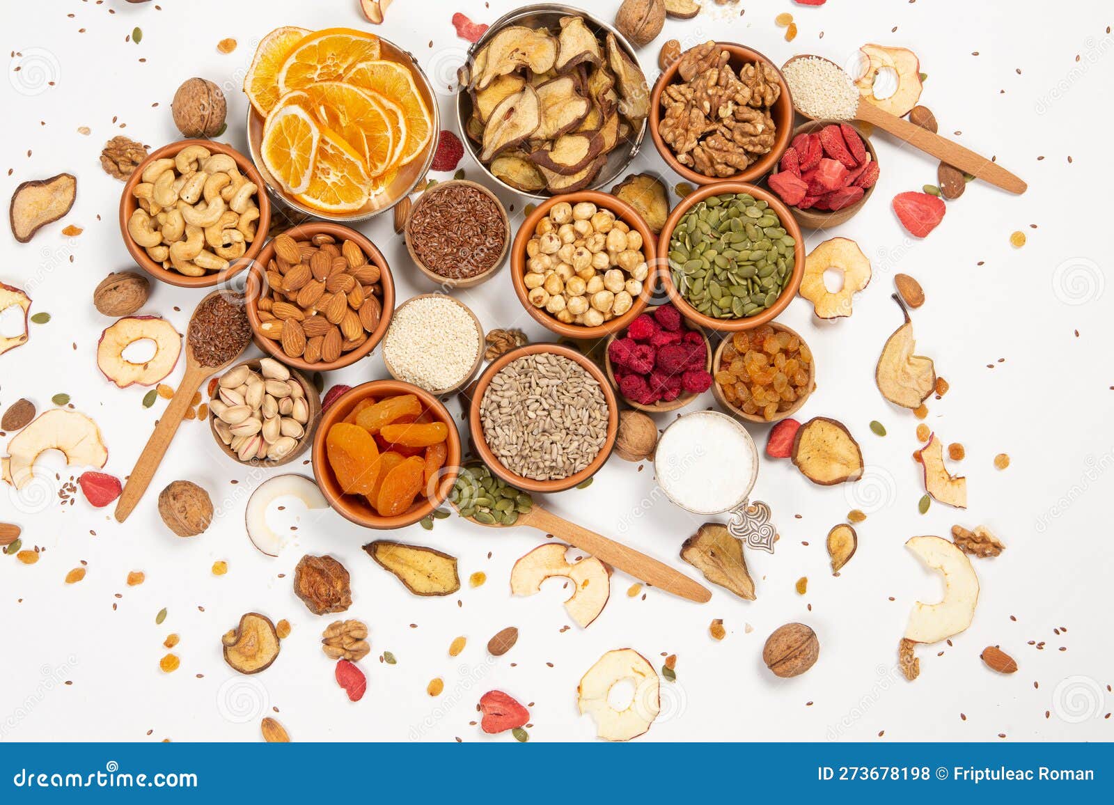 Healthy Vegetarian Food Concept Assortment Of Dried Fruits Nuts And Seeds On White Background