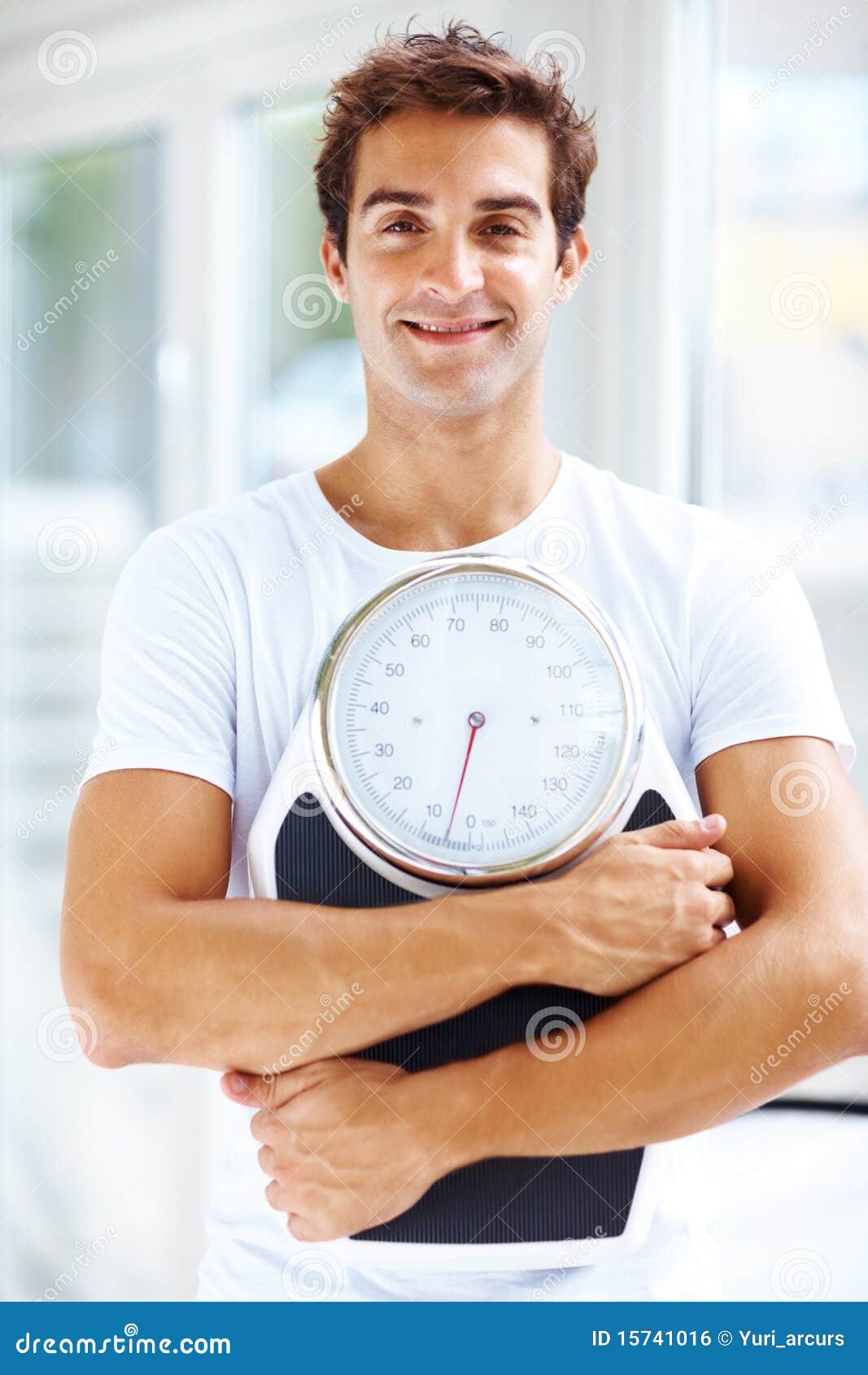 Healthy Young Man Holding a Weight Scale Stock Photo - Image of ...