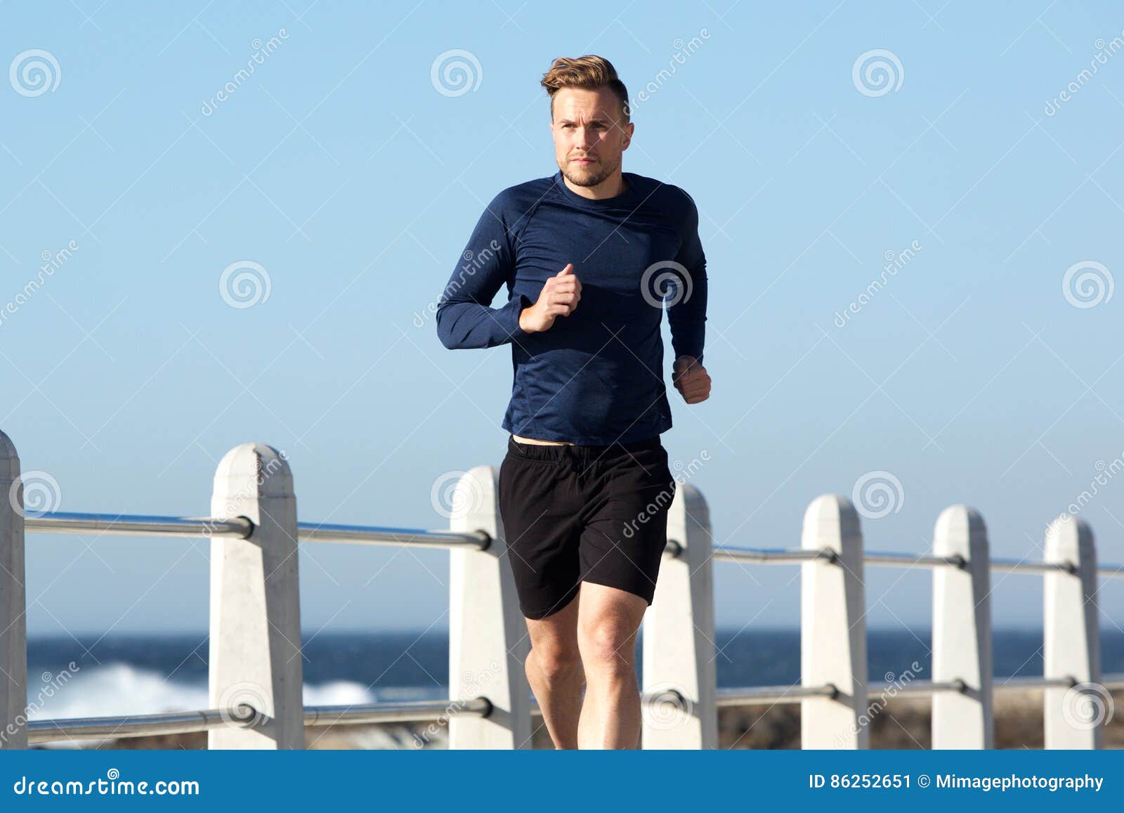 Healthy Young Man Jogging Outside Stock Image - Image of outdoor ...