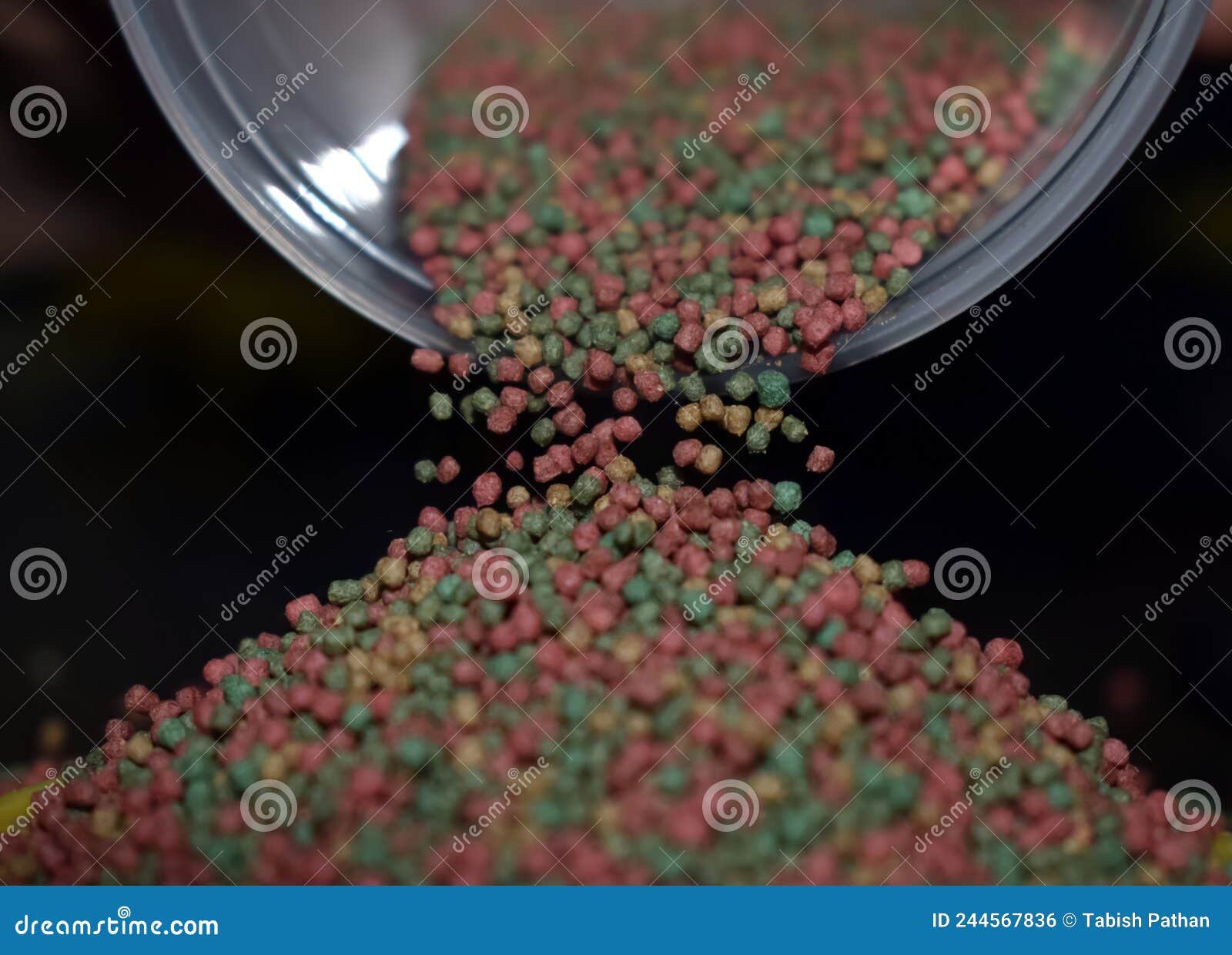 Heap of Colored Fish Food Granules on White Background Stock Photo ...