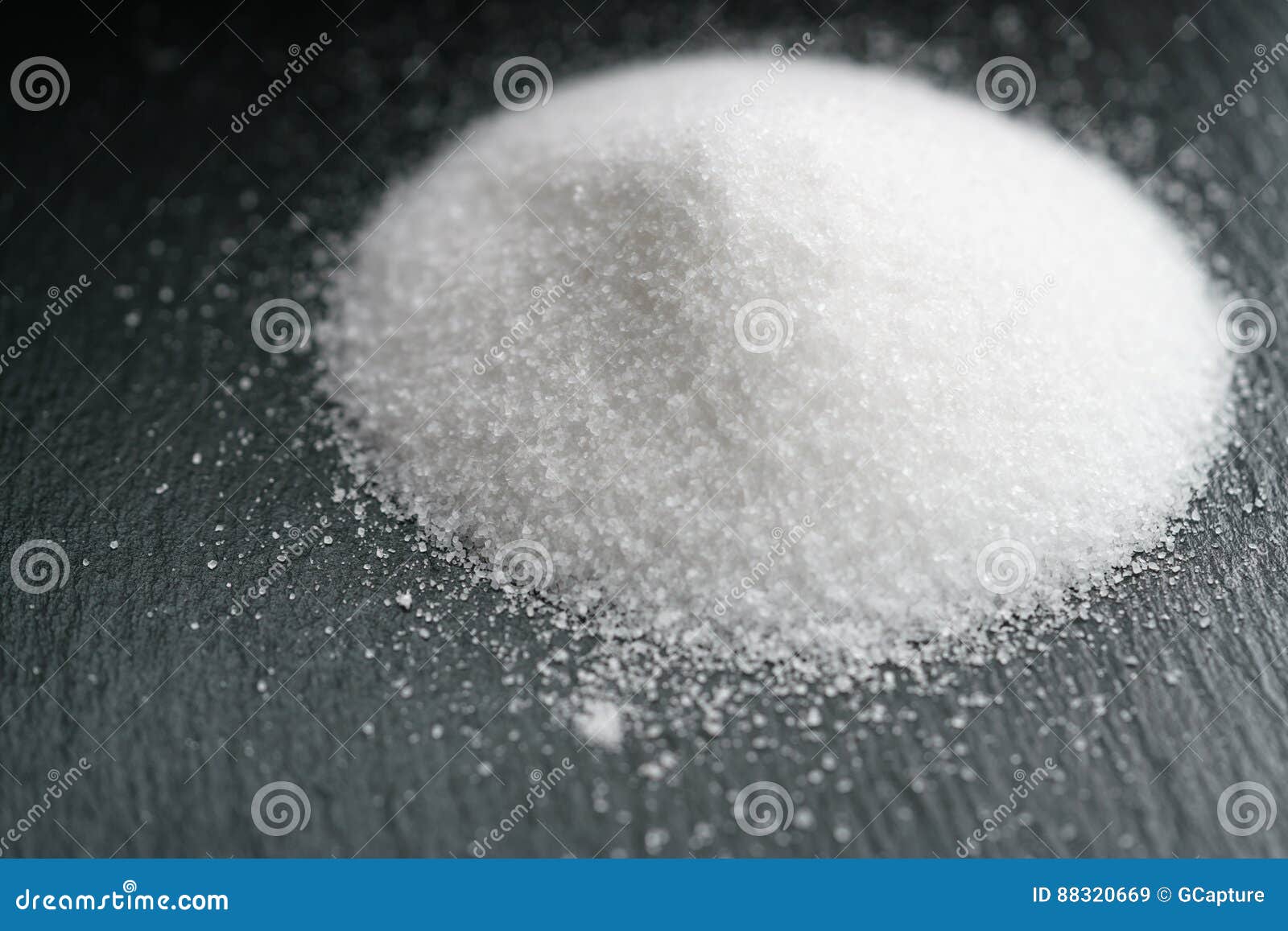 Heap of Extra Small Salt on Black Slate Background Stock Image - Image ...