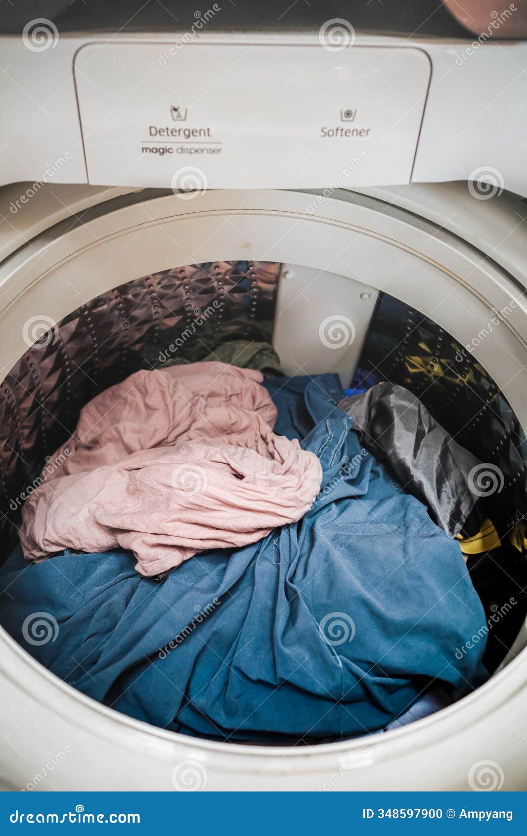 Heap of Laundry Inside of Top Loading Washing Machine Stock Photo ...