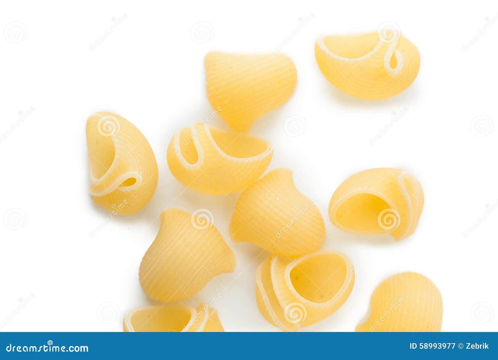 Heap of Macaroni Shells, Selective Focus. Isolated on White. Stock ...
