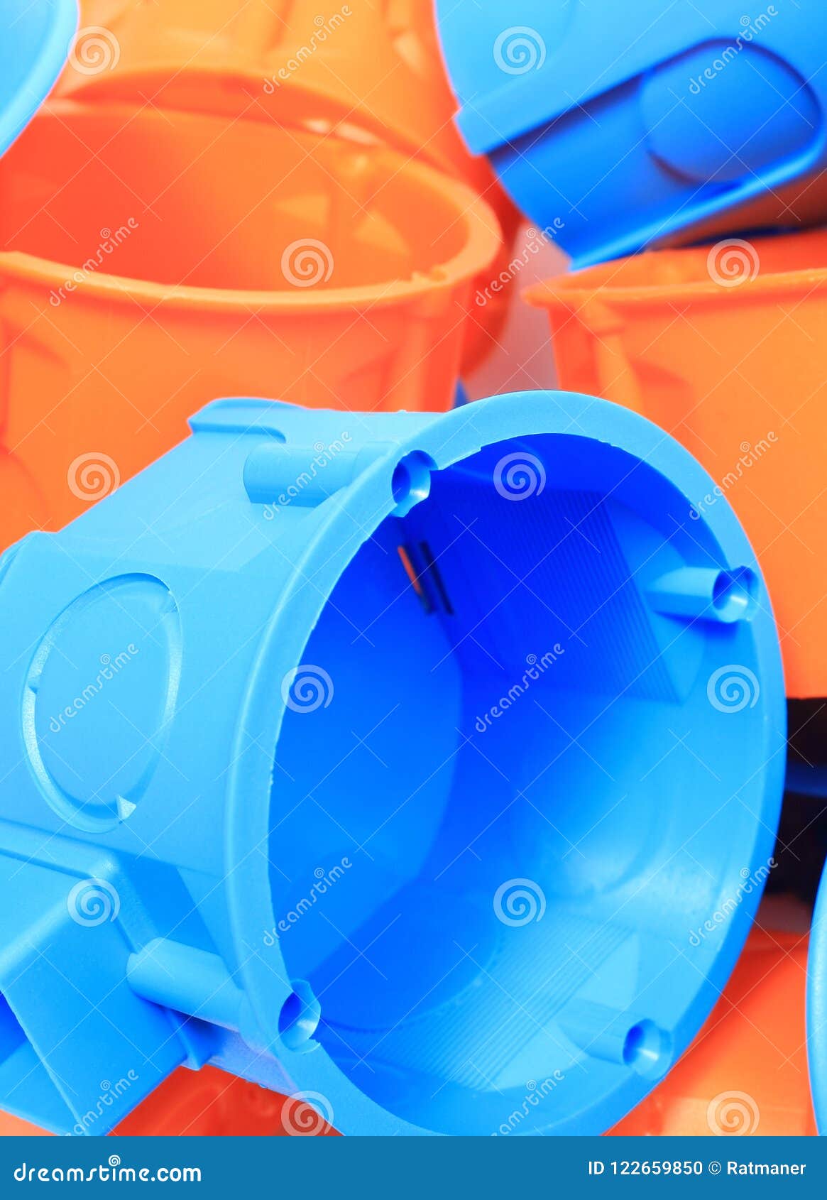 Heap of Orange and Blue Electrical Boxes Stock Photo - Image of plastic ...
