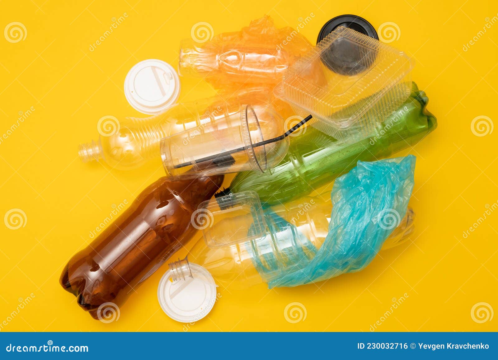 Heap of Plastic Disposable Packaging and Disposable Tableware on Yellow ...