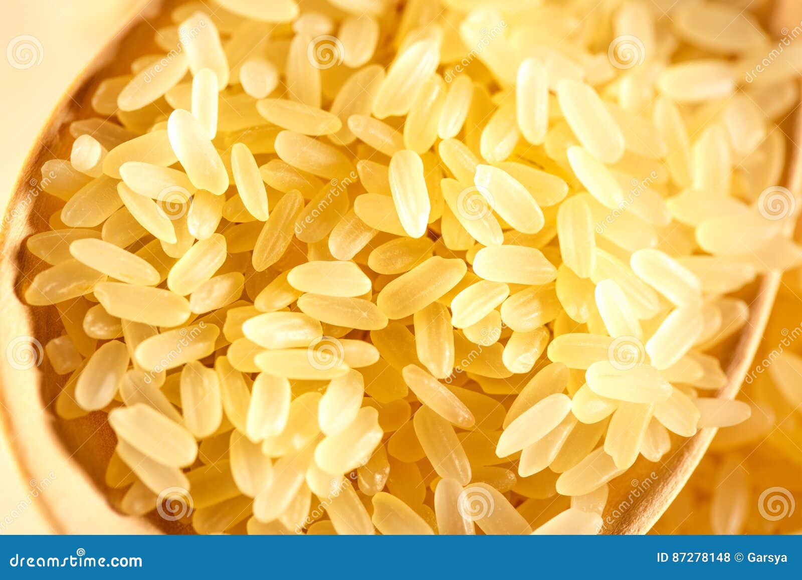 Heap of Rice with Wooden Spoon Stock Photo - Image of isolated, heap ...