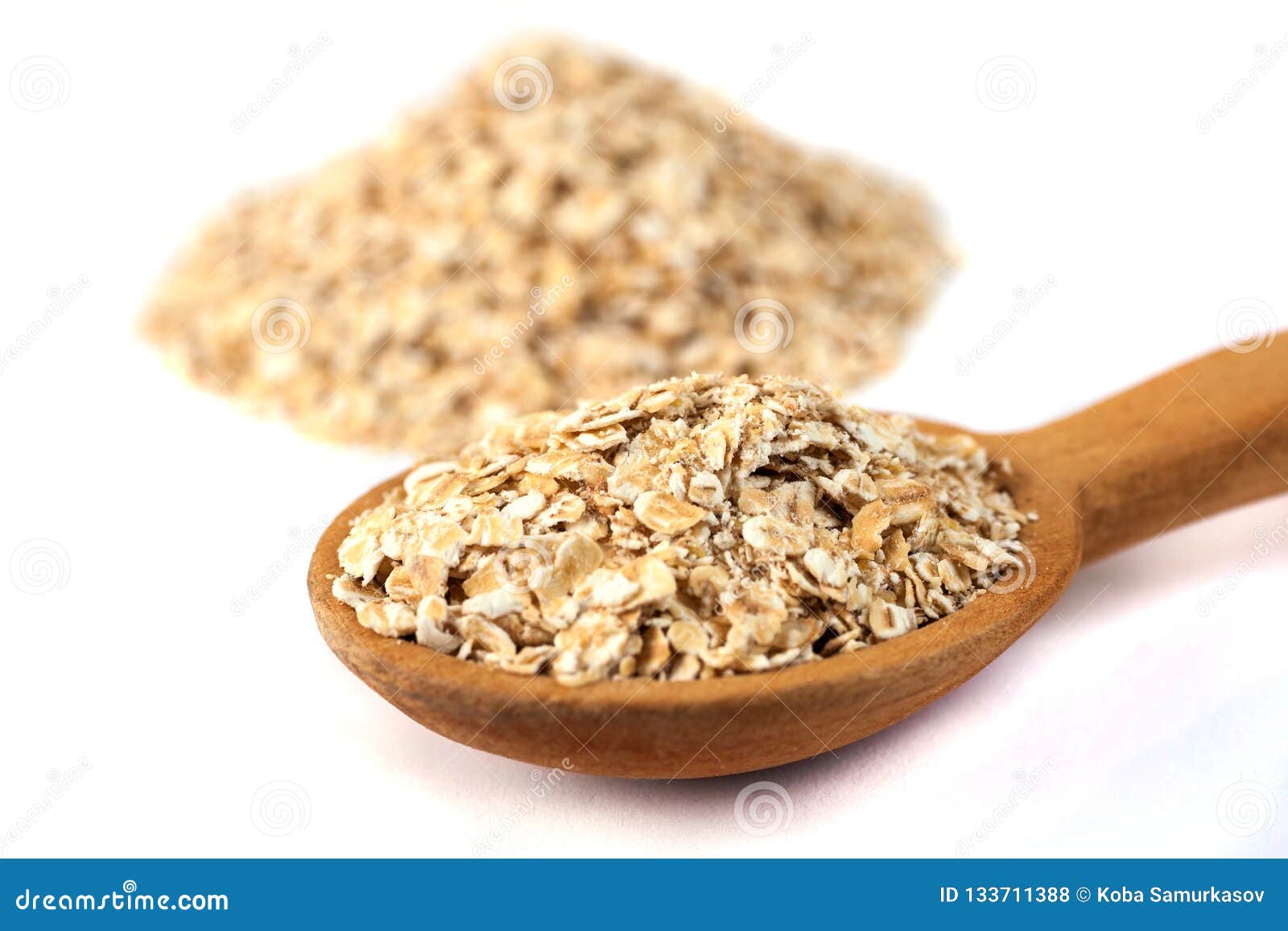 Heap of Rolled Oats with Wooden Spoon on White Stock Photo - Image of ...