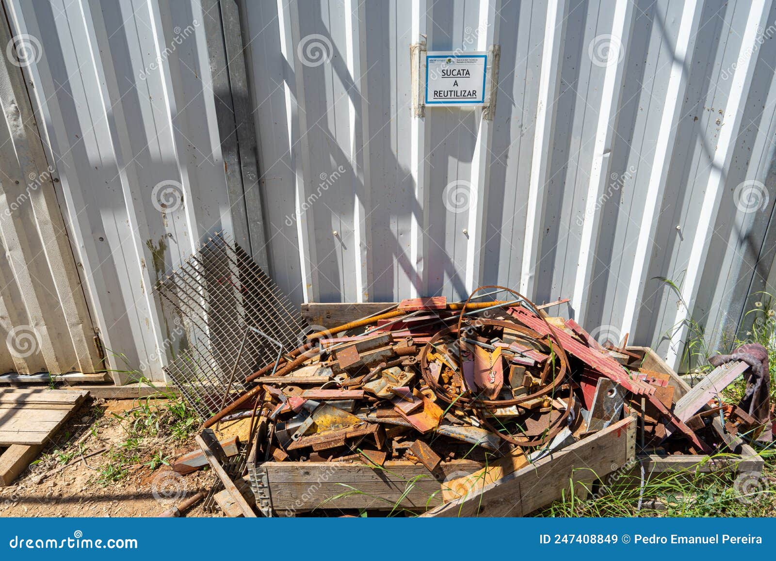 Heap of Scrap Metal from Industrial Objects Leaning Against the Wall ...