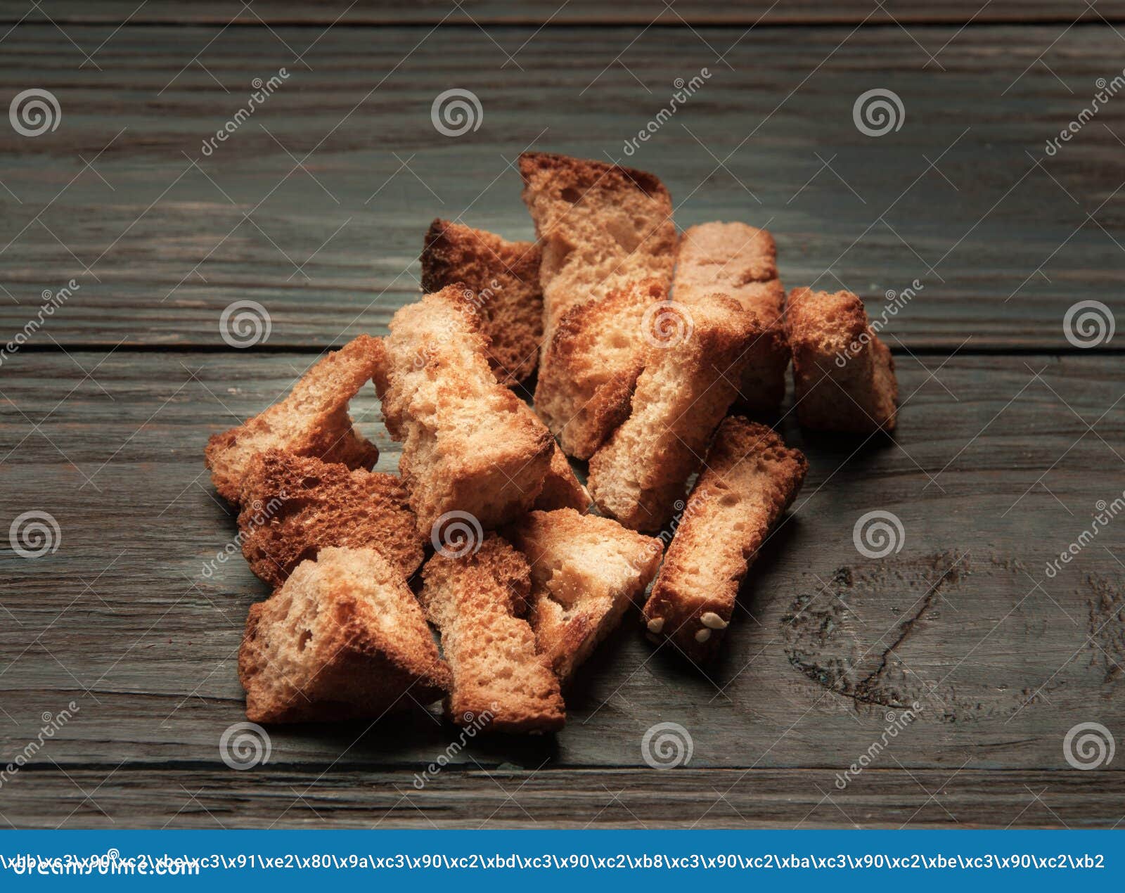 Heap of Small Rusks from Black Bread on a Rustic Wooden Table Stock ...