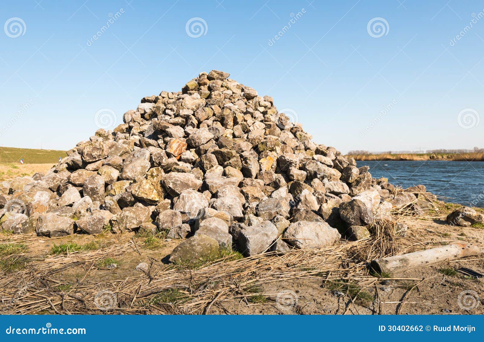 Heap of Stones Along a River Stock Photo - Image of heap, bank: 30402662