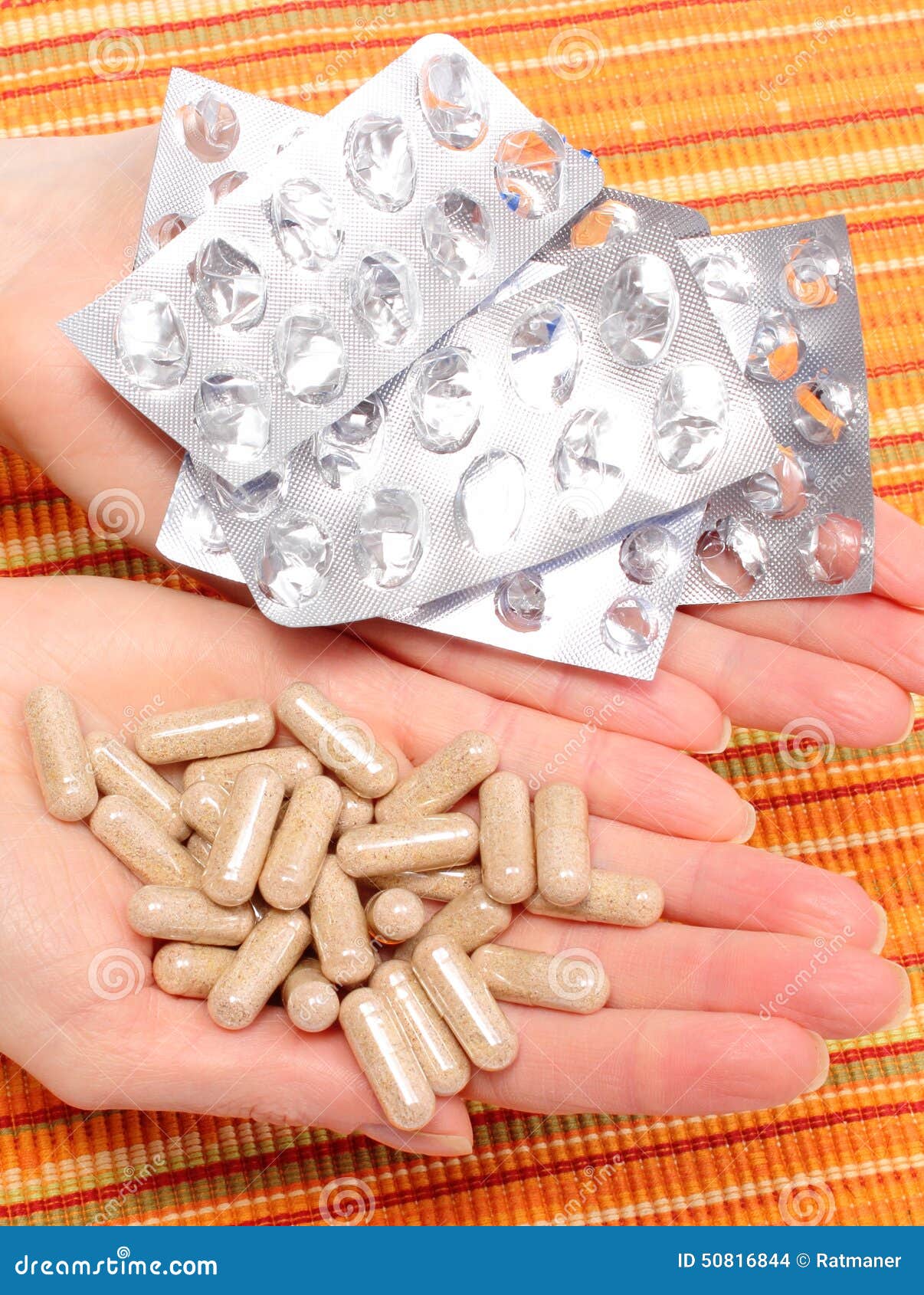 Heap of Tablets and Empty Pills Blisters in Hand Stock Photo - Image of ...