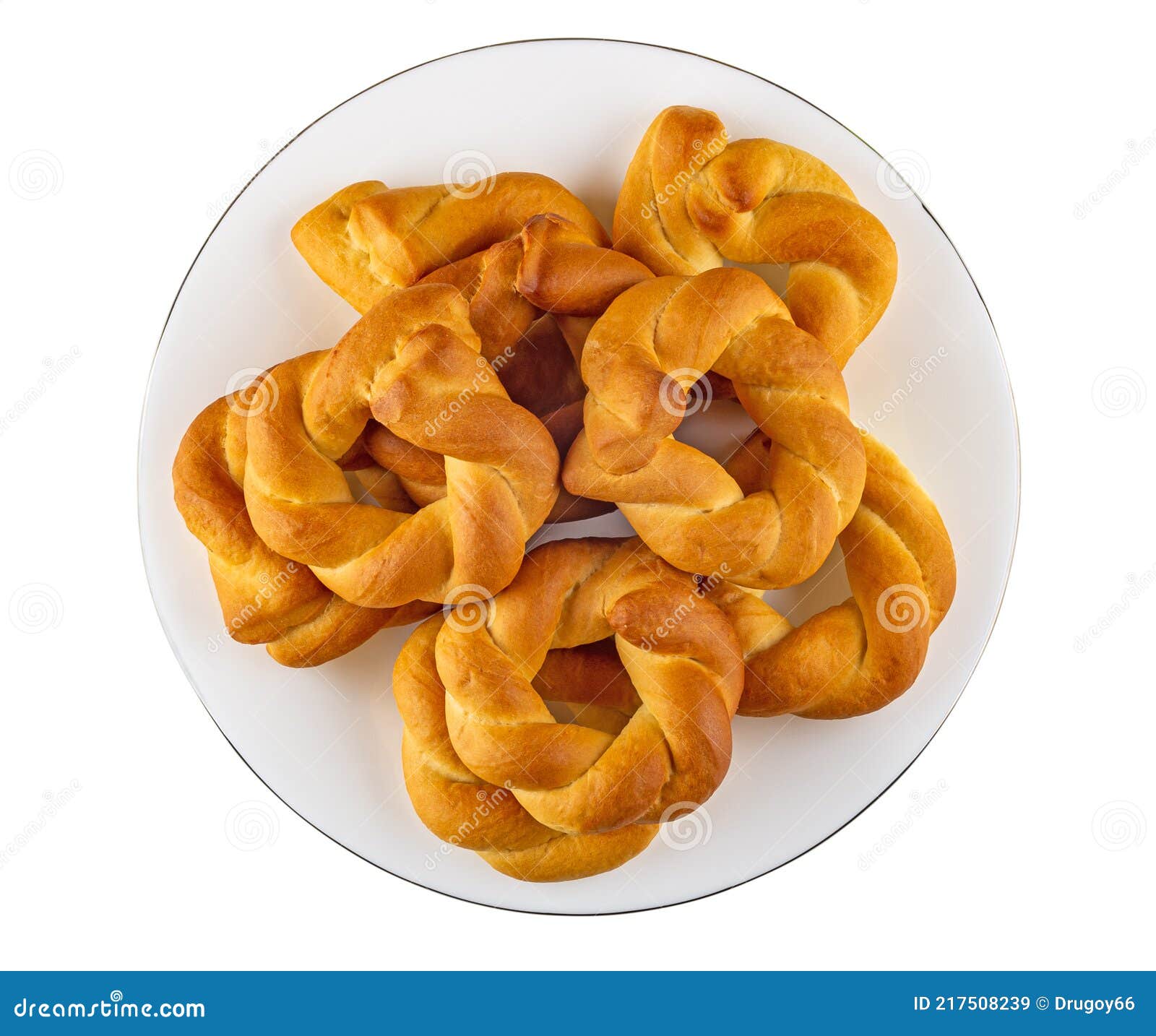 Heap of Wicker Buns in Shape Ring in Plate Isolated on White. Top View ...