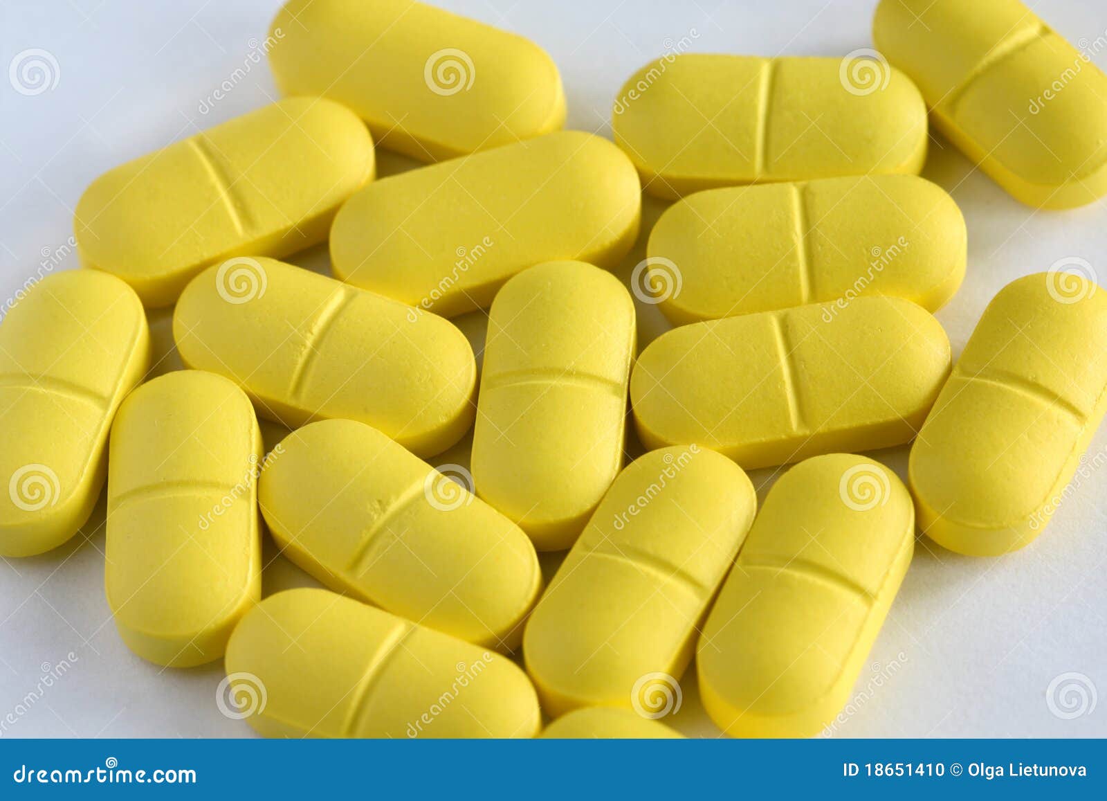 Heap of yellow pills stock photo. Image of tablet, healthy - 18651410