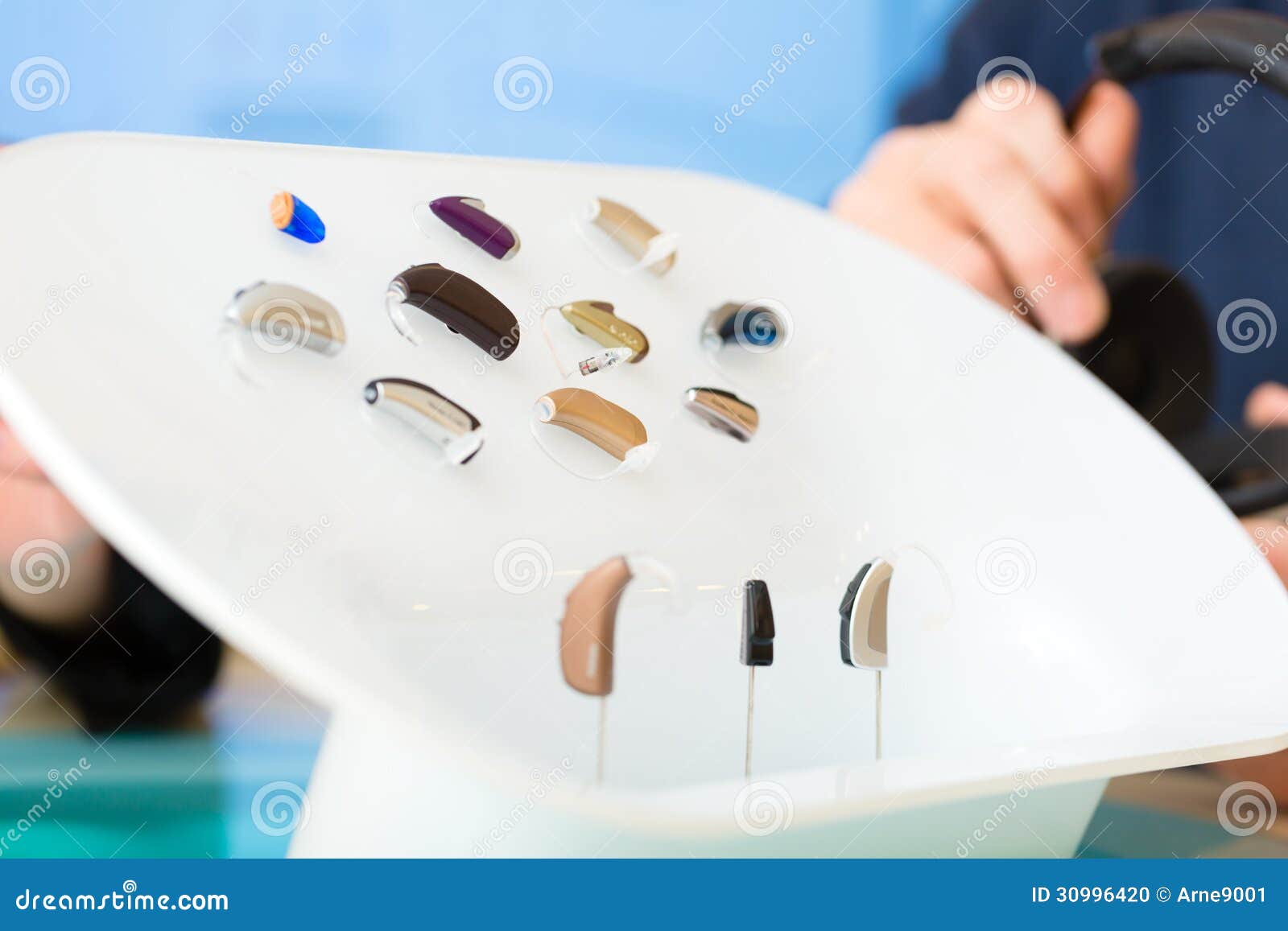 Hearing Aid on a Presentation Table Stock Photo - Image of sales ...