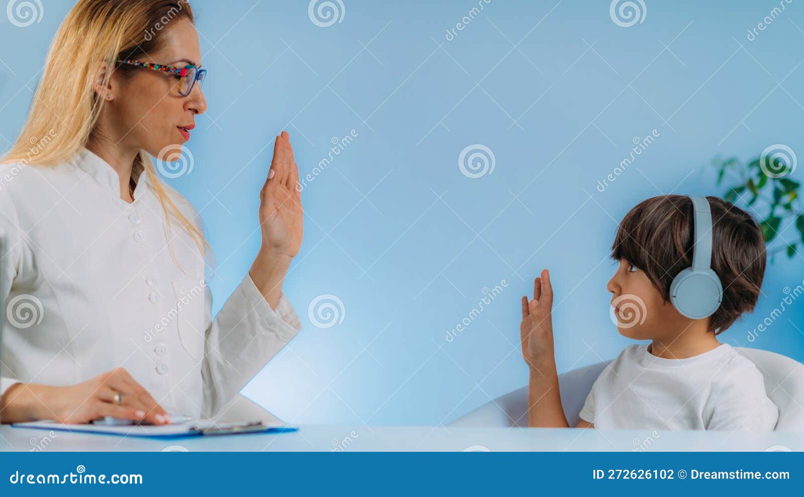 Hearing Test for Children. Audiologist Working with a Preschooler Boy ...